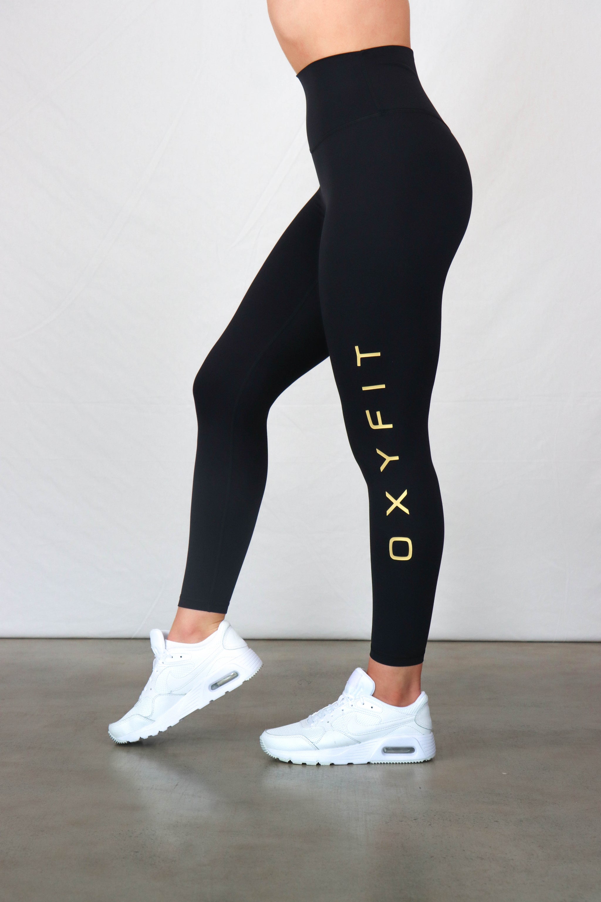 Black Oxyfit OXYTECH Womens Leggings | Metallic Gold logo